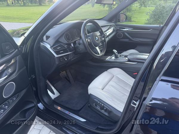Black BMW X5 2016 in Tartu, with an engine capacity of 3.00 L and mileage of 198 thousand km for 21000 €, photo 10 on AUTOMOTO.COM.LV