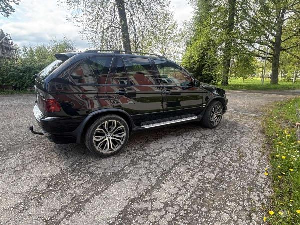 BMW X5 2002 AlÅ«ksne vietnÄ Melns BMW X5 2002 AlÅ«ksne, ar dzinÄja tilpumu 4.60 L un nobraukumu 246 tÅ«kst. km par 8000 ā¬, foto 5 vietnÄ AUTOMOTO.COM.LV
