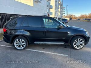 Black BMW X5 2007 in Tartu, with an engine capacity of 3.00 L and mileage of 382 thousand km for 7800 €, photo 6 on AUTOMOTO.COM.LV