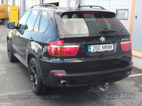 Black BMW X5 2007 in Tartu, with an engine capacity of 3.00 L and mileage of 280 thousand km for 8890 €, photo 4 on AUTOMOTO.COM.LV