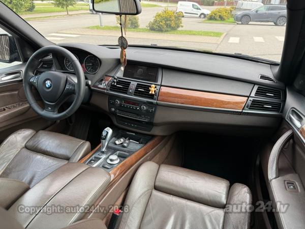 Black BMW X5 2008 in Tartu, with an engine capacity of 3.00 L and mileage of 404 thousand km for 7999 €, photo 11 on AUTOMOTO.COM.LV