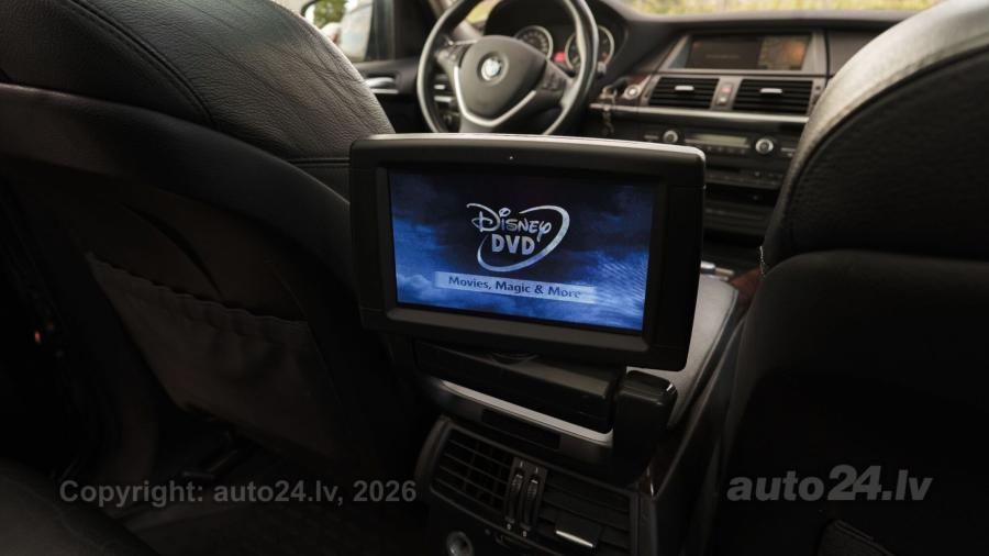 Black BMW X5 2009 in Tartu, with an engine capacity of 3.00 L and mileage of 465 thousand km for 6500 €, photo 14 on AUTOMOTO.COM.LV