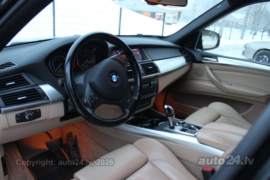 Black BMW X5 2010 in Tallinn, with an engine capacity of 3.00 L and mileage of 344 thousand km for 10900 €, photo 10 on AUTOMOTO.COM.LV