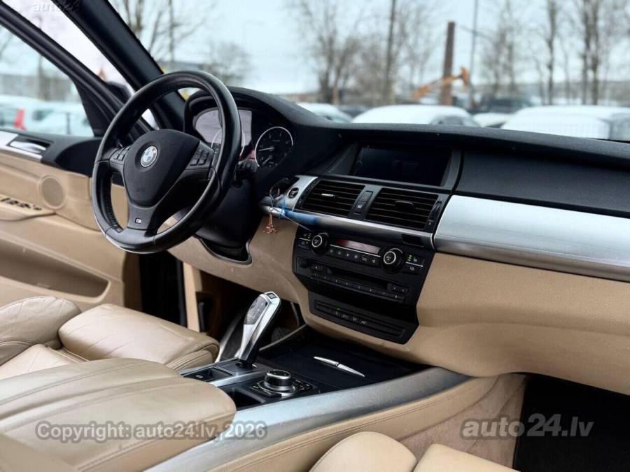 Melns BMW X5 2010 Tallina, ar dzinēja tilpumu 3.00 L un nobraukumu 225 tūkst. km par 10499 €, foto 11 vietnē AUTOMOTO.COM.LV