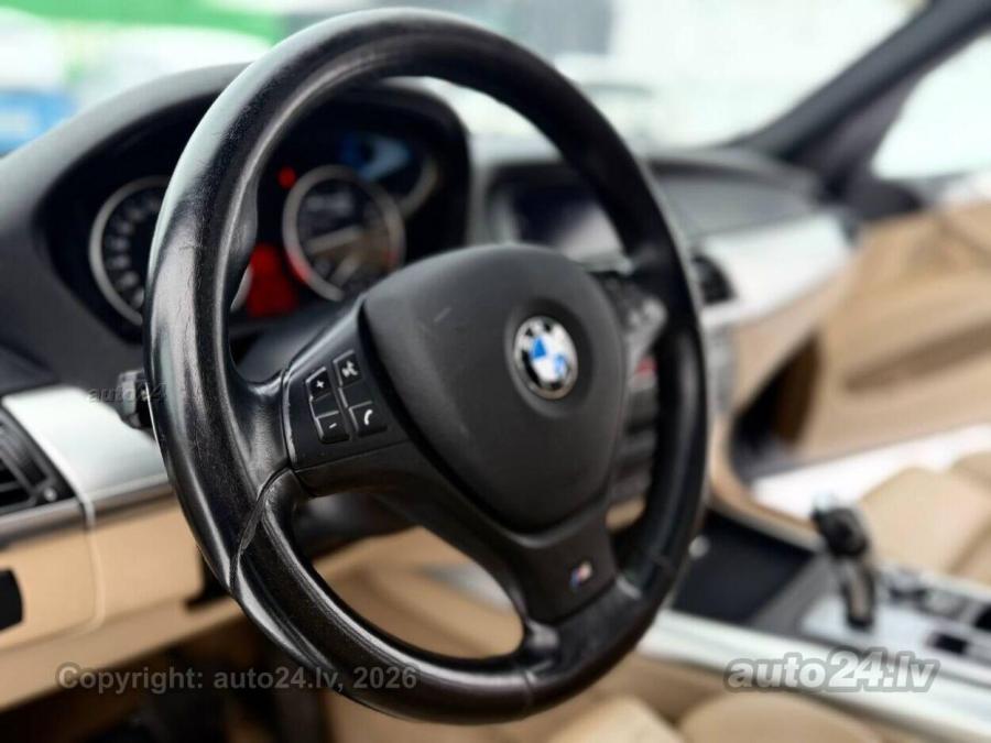 Melns BMW X5 2010 Tallina, ar dzinēja tilpumu 3.00 L un nobraukumu 225 tūkst. km par 10499 €, foto 13 vietnē AUTOMOTO.COM.LV