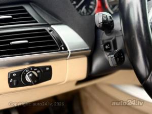 Melns BMW X5 2010 Tallina, ar dzinēja tilpumu 3.00 L un nobraukumu 225 tūkst. km par 10499 €, foto 14 vietnē AUTOMOTO.COM.LV