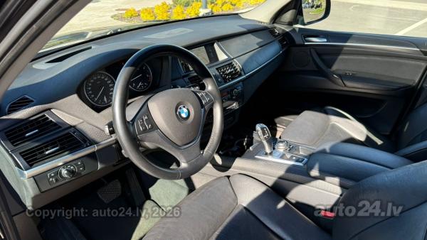 Black BMW X5 2012 in Parnu, with an engine capacity of 3.00 L and mileage of 305 thousand km for 10200 €, photo 9 on AUTOMOTO.COM.LV