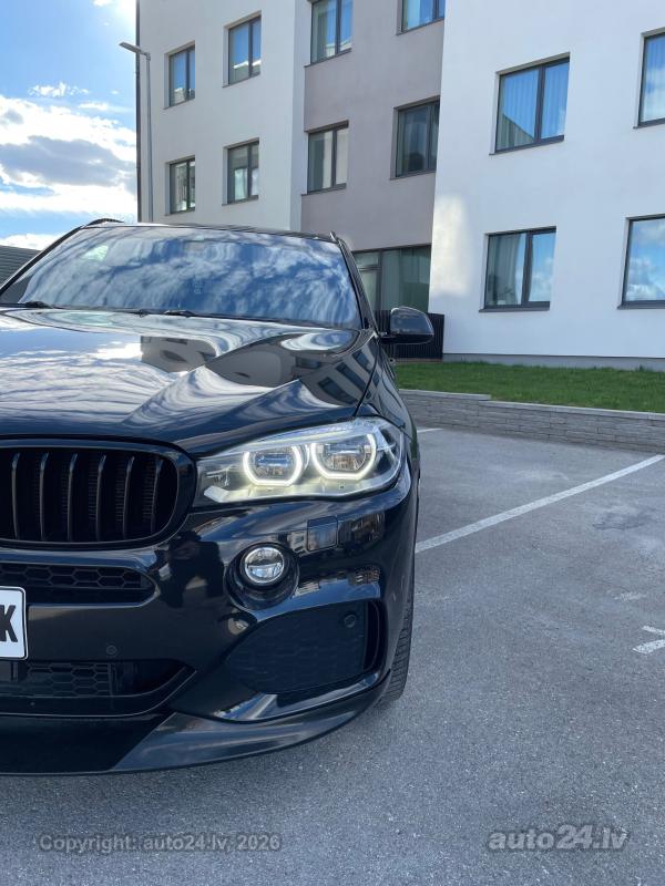Black BMW X5 2014 in Tartu, with an engine capacity of 3.00 L and mileage of 186 thousand km for 22999 €, photo 4 on AUTOMOTO.COM.LV