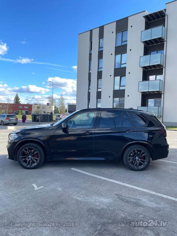 Black BMW X5 2014 in Tartu, with an engine capacity of 3.00 L and mileage of 186 thousand km for 22999 €, photo 6 on AUTOMOTO.COM.LV