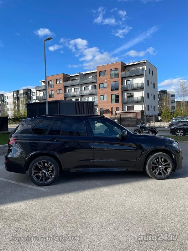 Black BMW X5 2014 in Tartu, with an engine capacity of 3.00 L and mileage of 186 thousand km for 22999 €, photo 7 on AUTOMOTO.COM.LV