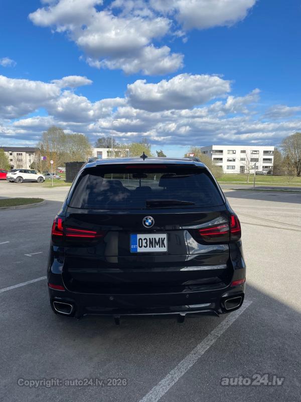 Black BMW X5 2014 in Tartu, with an engine capacity of 3.00 L and mileage of 186 thousand km for 22999 €, photo 9 on AUTOMOTO.COM.LV