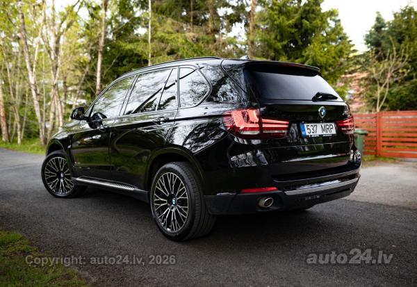 Black BMW X5 2014 in Tallinn, with an engine capacity of 3.00 L and mileage of 238 thousand km for 19990 €, photo 5 on AUTOMOTO.COM.LV