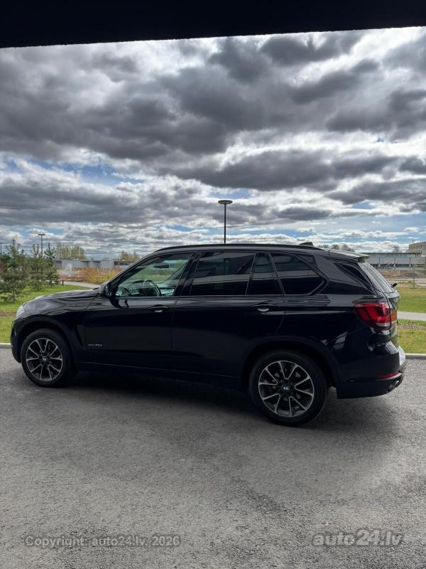 Black BMW X5 2016 in Tallinn, with an engine capacity of 3.00 L and mileage of 241 thousand km for 21999 €, photo 6 on AUTOMOTO.COM.LV