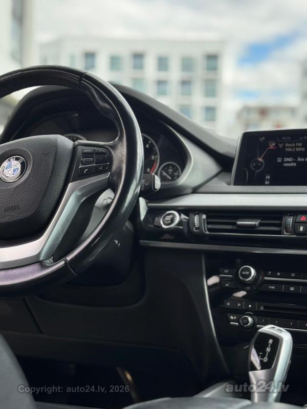 Black BMW X5 2016 in Tallinn, with an engine capacity of 3.00 L and mileage of 241 thousand km for 21999 €, photo 7 on AUTOMOTO.COM.LV