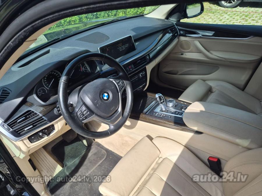 Melns BMW X5 2016 Tartu, ar dzinēja tilpumu 3.00 L un nobraukumu 200 tūkst. km par 23000 €, foto 10 vietnē AUTOMOTO.COM.LV