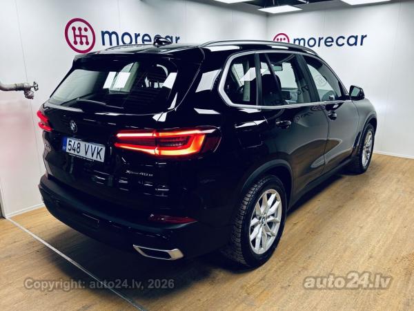 Black BMW X5 2021 in Tallinn, with an engine capacity of 3.00 L and mileage of 58 thousand km for 54900 €, photo 6 on AUTOMOTO.COM.LV