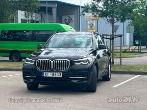 Black BMW X5 2021 in Riga, with an engine capacity of 3.00 L and mileage of 104 thousand km for 37650 €, photo  on AUTOMOTO.COM.LV