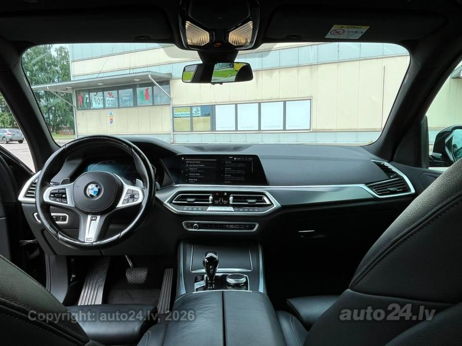Black BMW X5 2021 in Riga, with an engine capacity of 3.00 L and mileage of 104 thousand km for 37650 €, photo 12 on AUTOMOTO.COM.LV