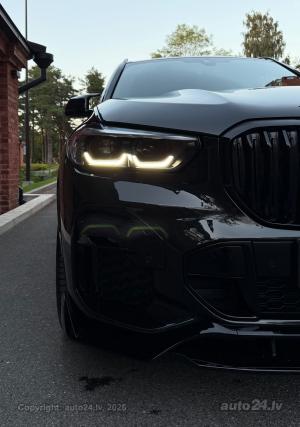 Black BMW X5 2022 in Tallinn, with an engine capacity of 3.00 L and mileage of 83 thousand km for 44900 €, photo 7 on AUTOMOTO.COM.LV