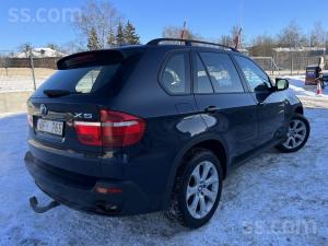 Blue BMW X5 2007 in Riga, with an engine capacity of 3.00 L and mileage of 0 thousand km for 7990 €, photo 4 on AUTOMOTO.COM.LV