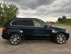Blue BMW X5 2008 in Riga, with an engine capacity of 3.00 L and mileage of 340 thousand km for 9499 €, photo 6 on AUTOMOTO.COM.LV