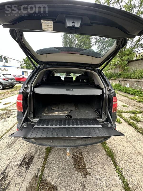 Blue BMW X5 2008 in Riga, with an engine capacity of 3.00 L and mileage of 319 thousand km for 7999 €, photo 7 on AUTOMOTO.COM.LV