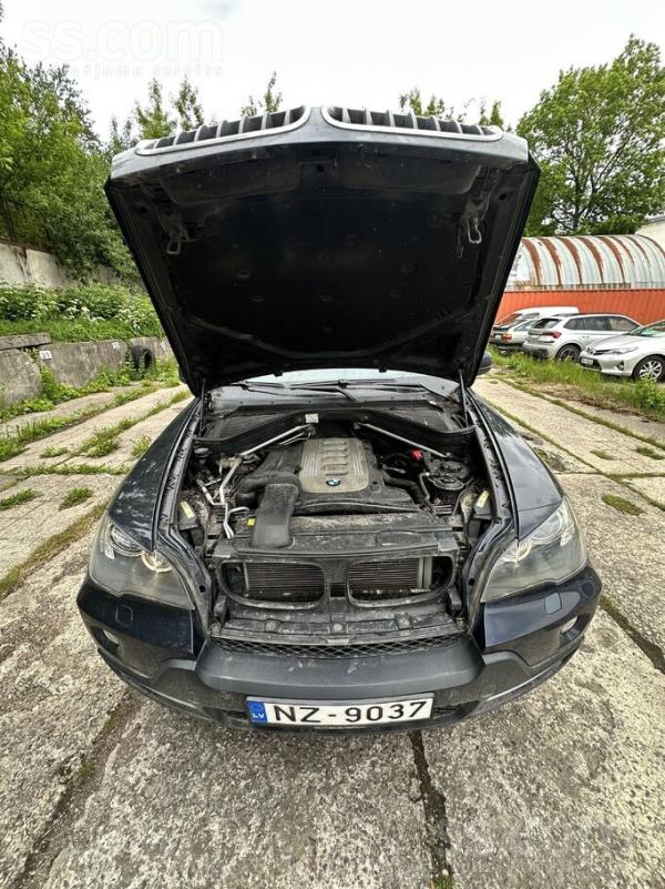 Blue BMW X5 2008 in Riga, with an engine capacity of 3.00 L and mileage of 319 thousand km for 7999 €, photo 8 on AUTOMOTO.COM.LV
