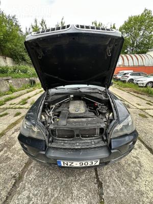 Blue BMW X5 2008 in Riga, with an engine capacity of 3.00 L and mileage of 319 thousand km for 7999 €, photo 9 on AUTOMOTO.COM.LV