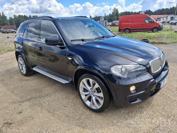Blue BMW X5 2008 in Riga, with an engine capacity of 3.00 L and mileage of 309 thousand km for 9995 €, photo 4 on AUTOMOTO.COM.LV