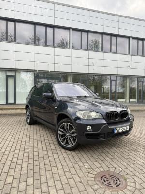 Blue BMW X5 2008 in Riga, with an engine capacity of 3.00 L and mileage of 322 thousand km for 8999 €, photo  on AUTOMOTO.COM.LV