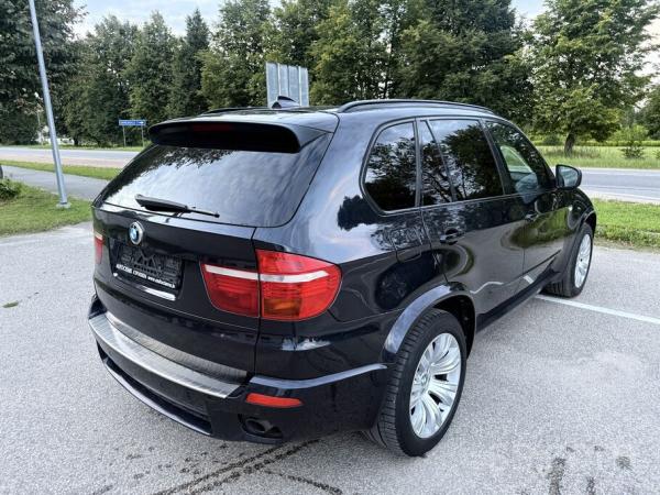 Blue BMW X5 2008 in Ogre, with an engine capacity of 3.00 L and mileage of 257 thousand km for 9499 €, photo 4 on AUTOMOTO.COM.LV