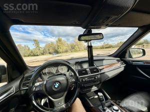 Blue BMW X5 2008 in Riga, with an engine capacity of 3.00 L and mileage of 418 thousand km for 9500 €, photo 12 on AUTOMOTO.COM.LV