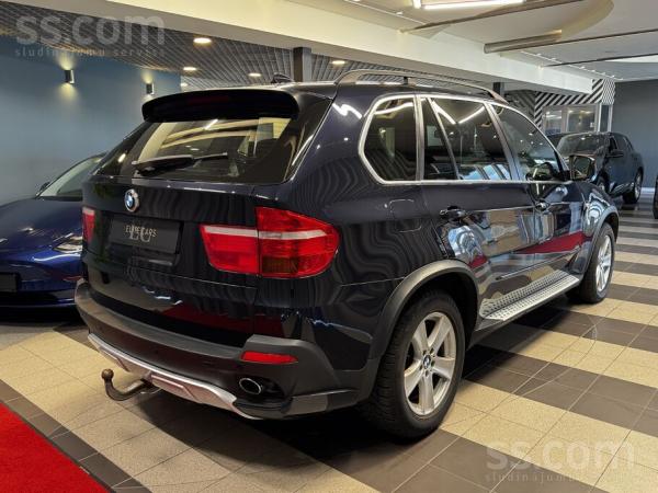 Blue BMW X5 2009 in Riga, with an engine capacity of 3.00 L and mileage of 213 thousand km for 8990 €, photo 4 on AUTOMOTO.COM.LV