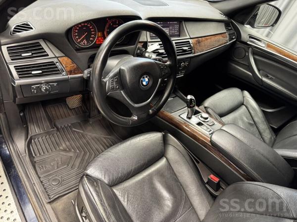 Blue BMW X5 2009 in Riga, with an engine capacity of 3.00 L and mileage of 213 thousand km for 8990 €, photo 10 on AUTOMOTO.COM.LV