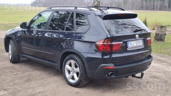 Blue BMW X5 2009 in Riga, with an engine capacity of 3.00 L and mileage of 251 thousand km for 8900 €, photo 4 on AUTOMOTO.COM.LV