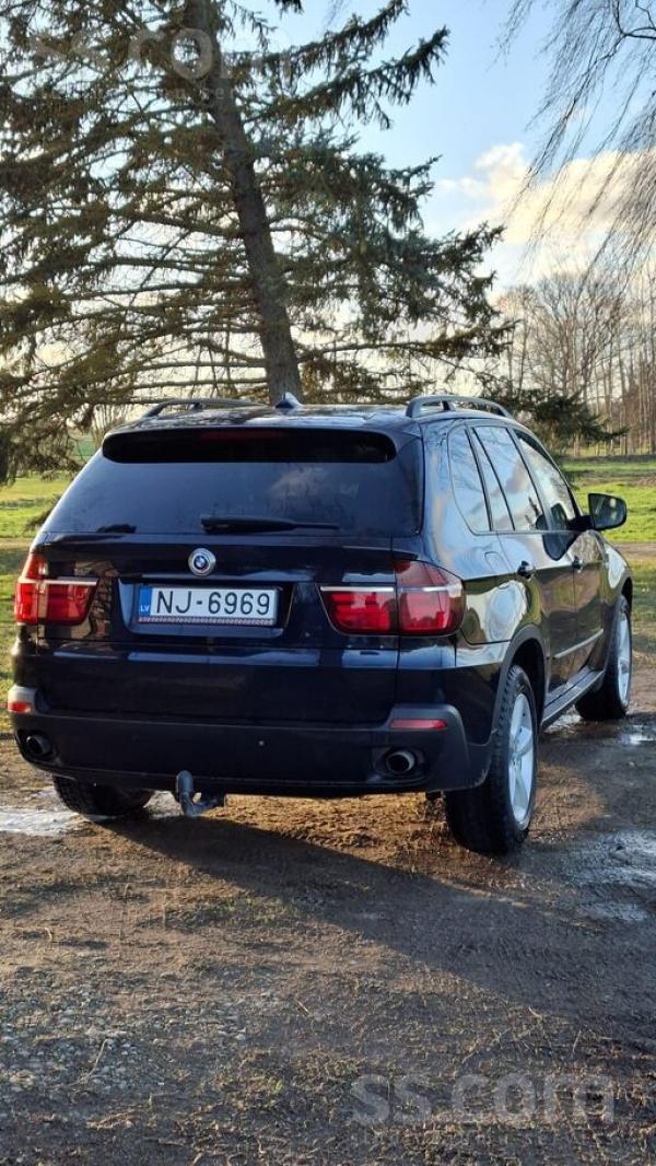 Blue BMW X5 2009 in Bauska, with an engine capacity of 3.00 L and mileage of 251 thousand km for 8900 €, photo 7 on AUTOMOTO.COM.LV