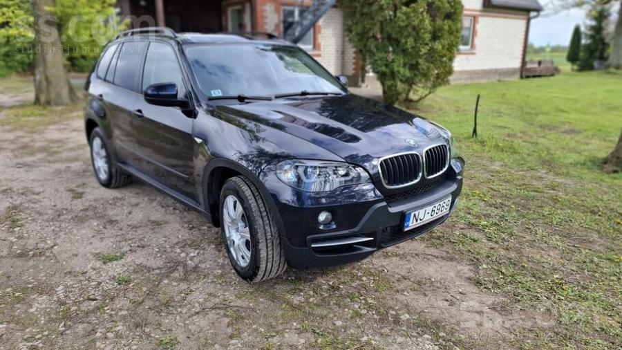 Blue BMW X5 2009 in Bauska, with an engine capacity of 3.00 L and mileage of 251 thousand km for 8900 €, photo 15 on AUTOMOTO.COM.LV
