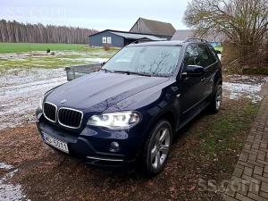 Blue BMW X5 2009 in Bauska, with an engine capacity of 3.00 L and mileage of 251 thousand km for 8900 €, photo 24 on AUTOMOTO.COM.LV