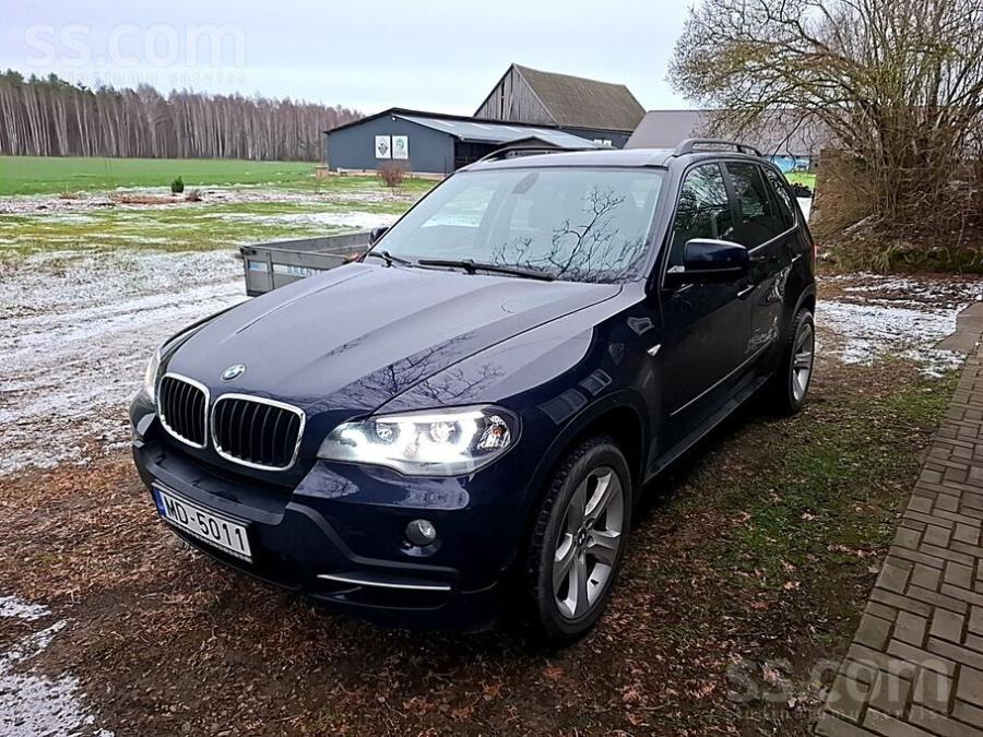 Blue BMW X5 2009 in Bauska, with an engine capacity of 3.00 L and mileage of 251 thousand km for 8900 €, photo 24 on AUTOMOTO.COM.LV