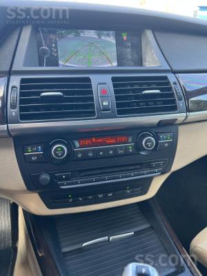 Blue BMW X5 2009 in Riga, with an engine capacity of 3.00 L and mileage of 369 thousand km for 9500 €, photo 9 on AUTOMOTO.COM.LV