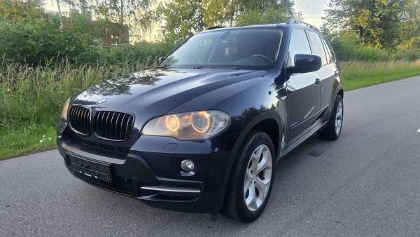 Blue BMW X5 2009 in Kaunas, with an engine capacity of 3.00 L and mileage of 313 thousand km for 7950 €, photo 10 on AUTOMOTO.COM.LV