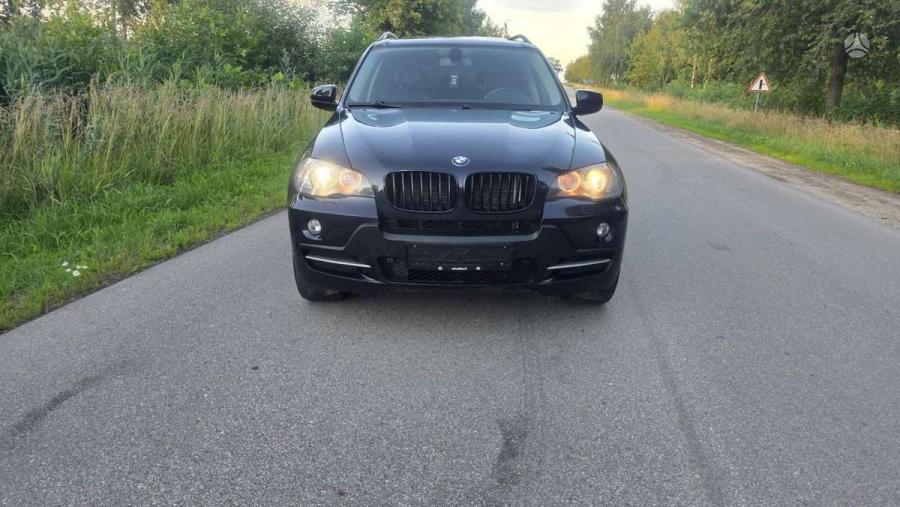 Blue BMW X5 2009 in Kaunas, with an engine capacity of 3.00 L and mileage of 313 thousand km for 7250 €, photo 12 on AUTOMOTO.COM.LV