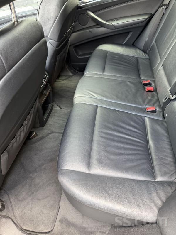 Blue BMW X5 2009 in Riga, with an engine capacity of 3.00 L and mileage of 263 thousand km for 8600 €, photo 11 on AUTOMOTO.COM.LV