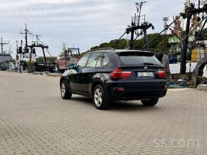 Blue BMW X5 2009 in Liepaja, with an engine capacity of 3.00 L and mileage of 0 thousand km for 7200 €, photo 27 on AUTOMOTO.COM.LV