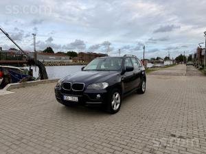 Blue BMW X5 2009 in Liepaja, with an engine capacity of 3.00 L and mileage of 0 thousand km for 7200 €, photo 36 on AUTOMOTO.COM.LV