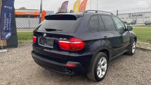 Blue BMW X5 2009 in Marijampole, with an engine capacity of 3.00 L and mileage of 313 thousand km for 7490 €, photo 11 on AUTOMOTO.COM.LV