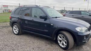 Blue BMW X5 2009 in Marijampole, with an engine capacity of 3.00 L and mileage of 313 thousand km for 7490 €, photo 12 on AUTOMOTO.COM.LV