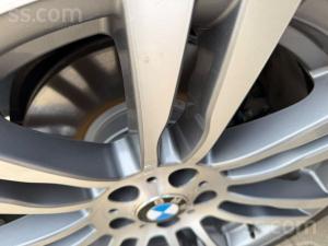Blue BMW X5 2011 in Riga, with an engine capacity of 3.00 L and mileage of 225 thousand km for 15800 €, photo 15 on AUTOMOTO.COM.LV