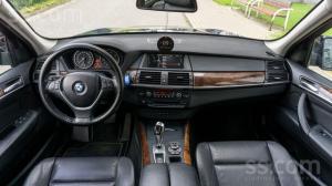 Blue BMW X5 2011 in Riga, with an engine capacity of 3.00 L and mileage of 305 thousand km for 9590 €, photo 12 on AUTOMOTO.COM.LV