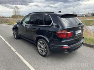 Blue BMW X5 2012 in Riga, with an engine capacity of 3.00 L and mileage of 305 thousand km for 9800 €, photo 4 on AUTOMOTO.COM.LV